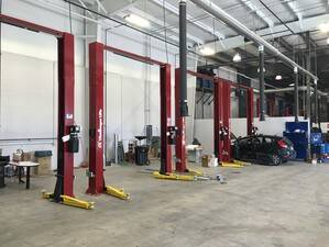 Lifting a Vehicle Using a Two-post, Frame-engaging Lift :: Collections ...